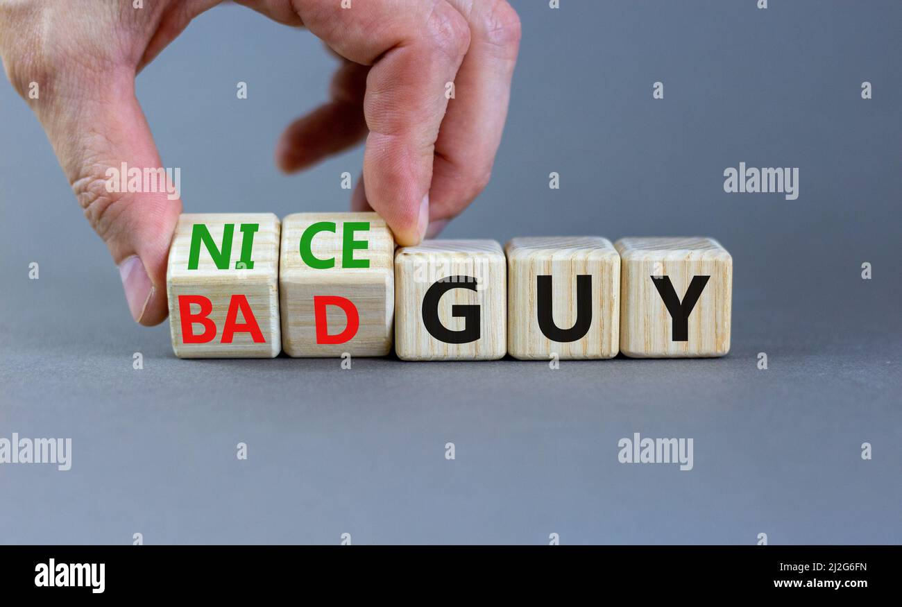 Nice or bad guy symbol. Businessman turns cubes and changes concept ...