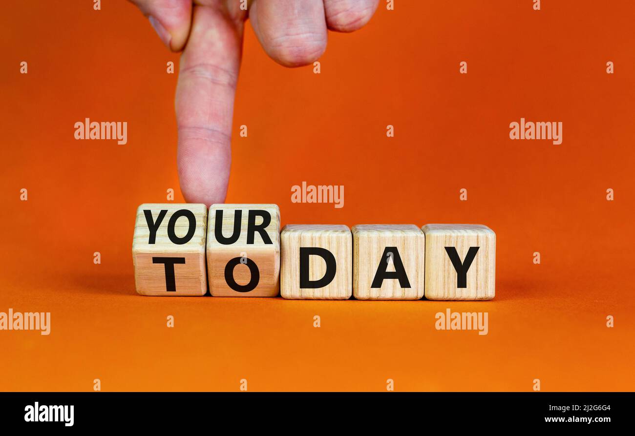 Today is your day symbol. Businessman turns wooden cubes and changes ...
