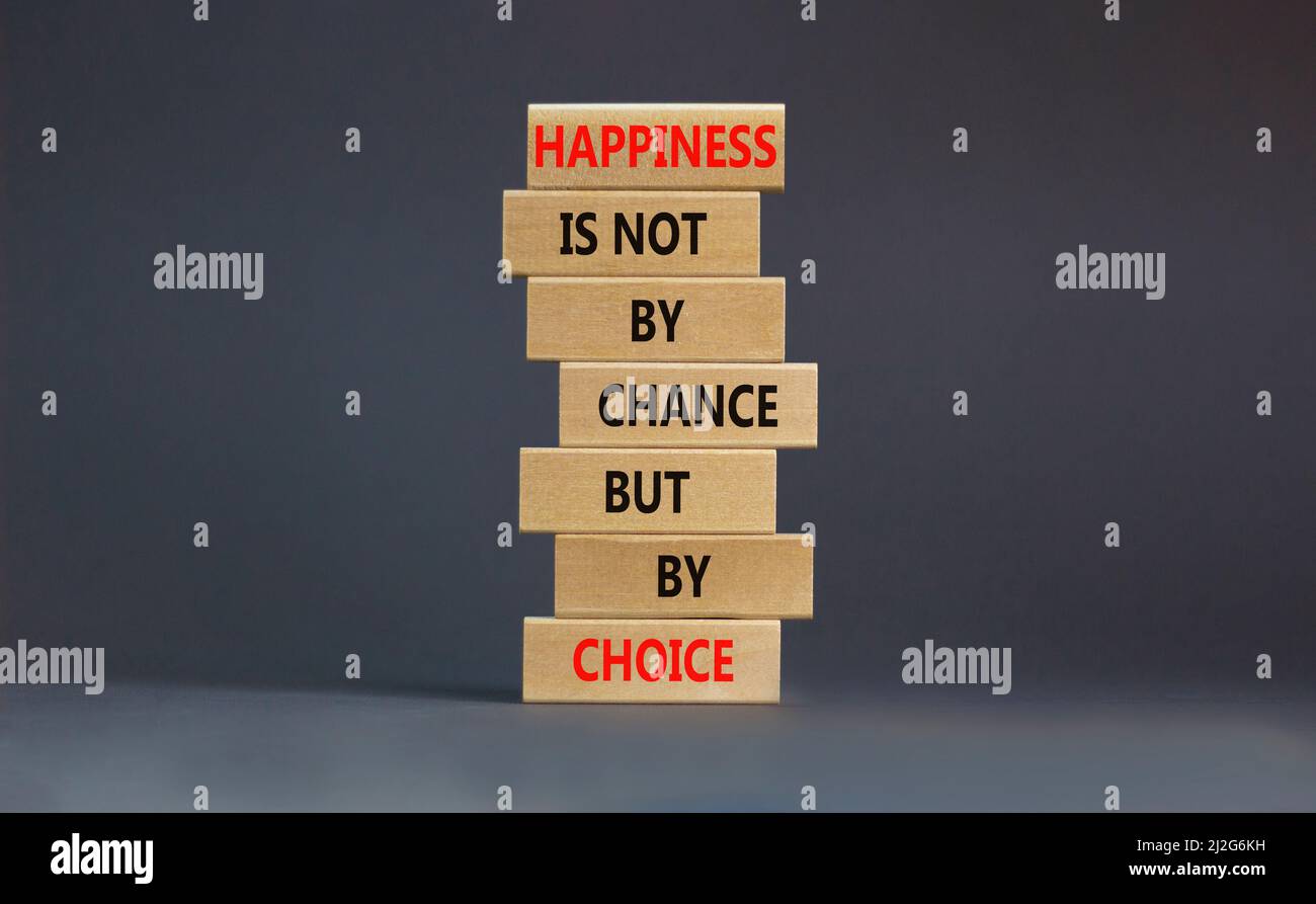 Happiness is choice symbol. Wooden blocks with words Happiness is not ...