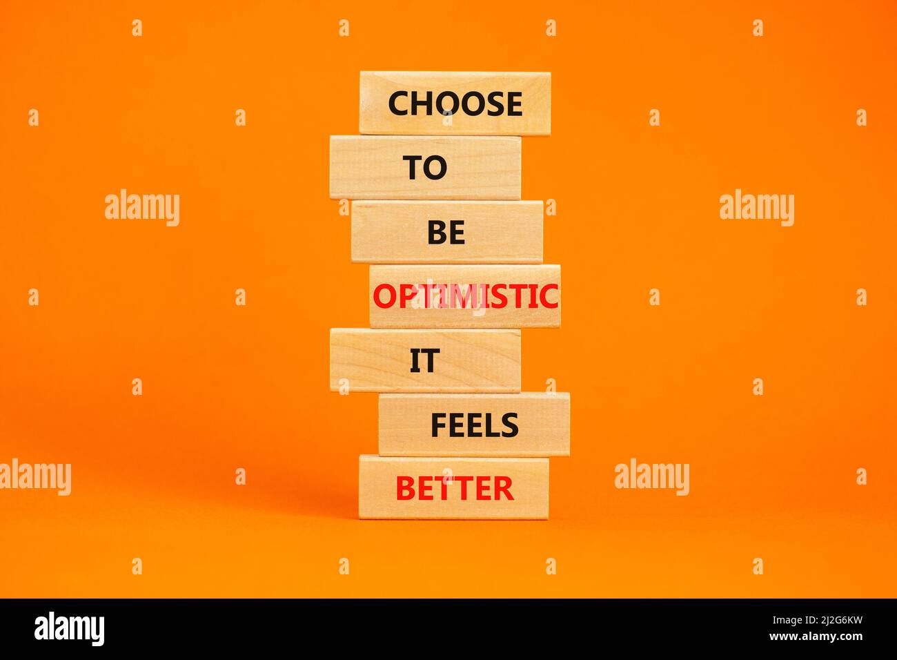 Optimistic is better symbol. Wooden blocks with words Choose to be ...