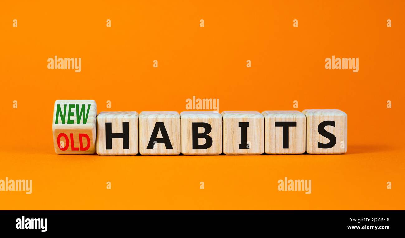 New or old habits symbol. Turned wooden cubes and changed concept words ...