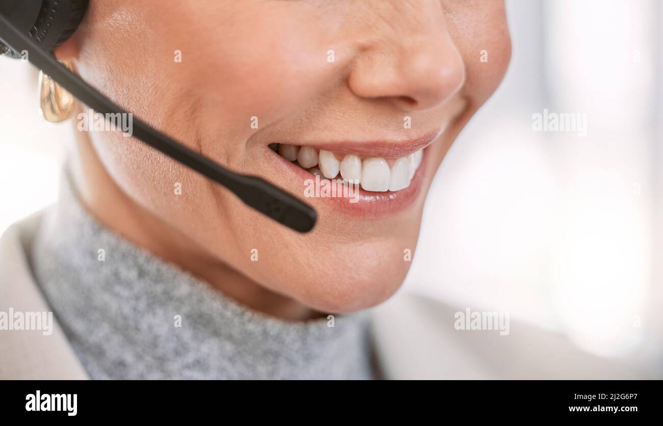 Ready to help. Cropped shot of an unrecognizable female call center ...