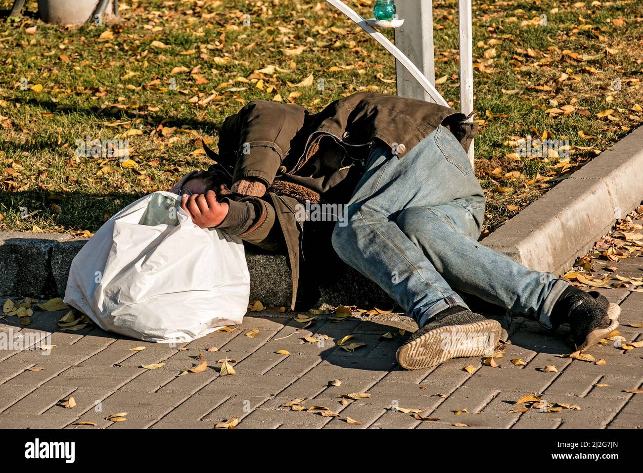 Homeless woman barefoot hi-res stock photography and images - Alamy