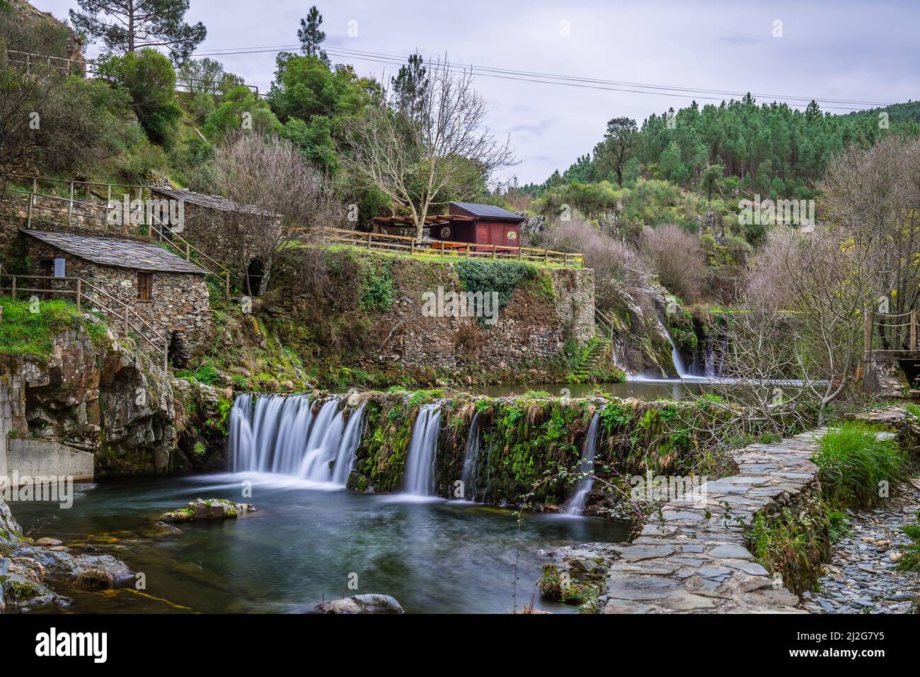 The view of the beautiful waterfall in Poco da Broca. Portugal Stock ...