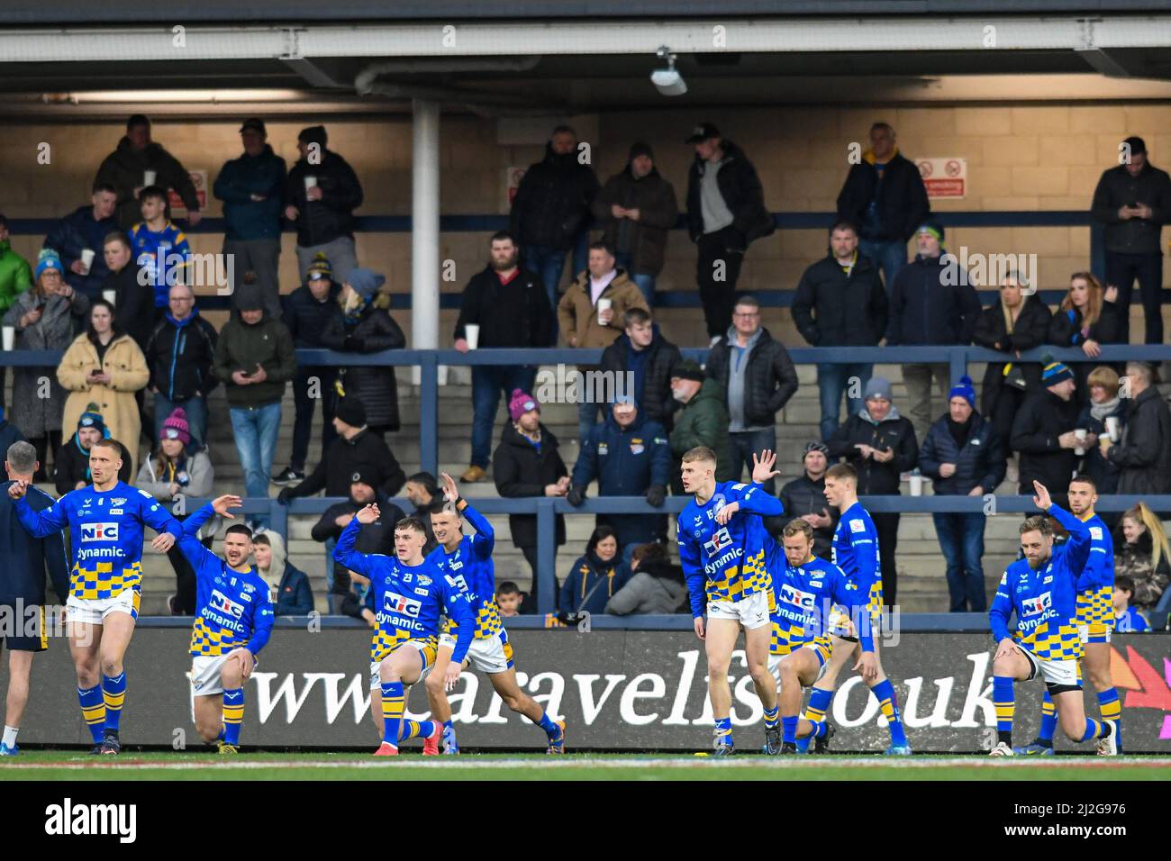 The Leeds Rhinos players begin their warm up Stock Photo - Alamy