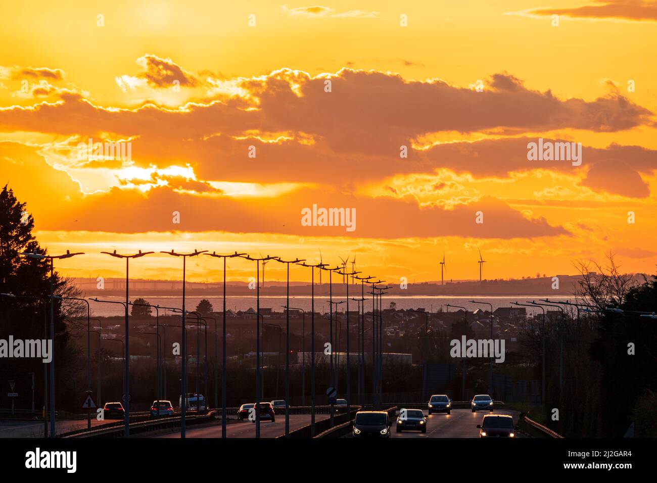 Sunset over traffic on the Thanet Way, A299, an English dual ...