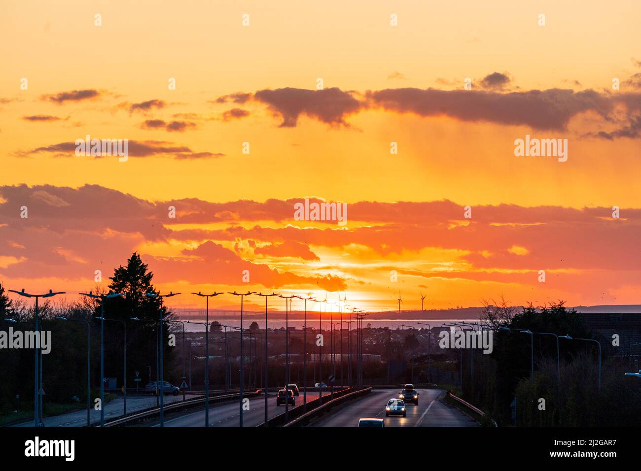 Sunset over traffic on the Thanet Way, A299, an English dual ...