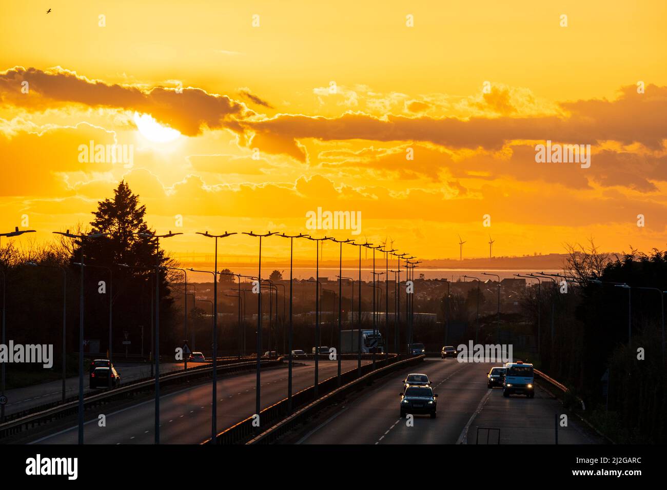 Sunset over traffic on the Thanet Way, A299, an English dual ...