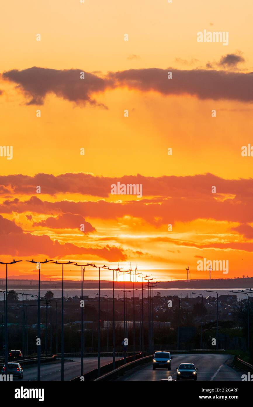 Sunset over traffic on the Thanet Way, A299, an English dual ...