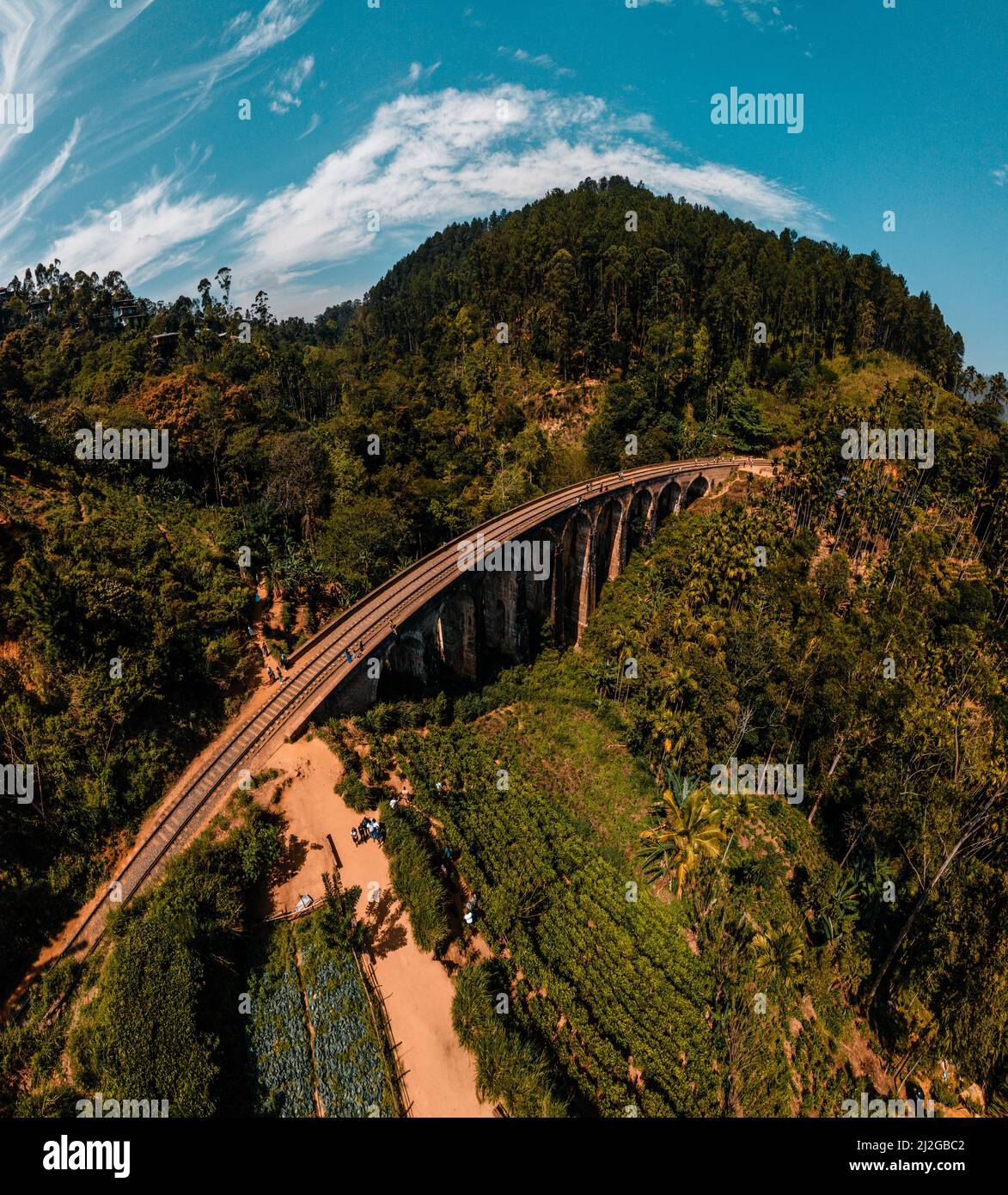 An aerial drone view of Nine Arch Bridge above the forests in Sri Lanka ...