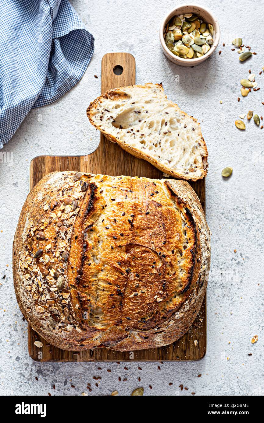Fresh homemade bread (slice) from whole grain sourdough flour with the ...