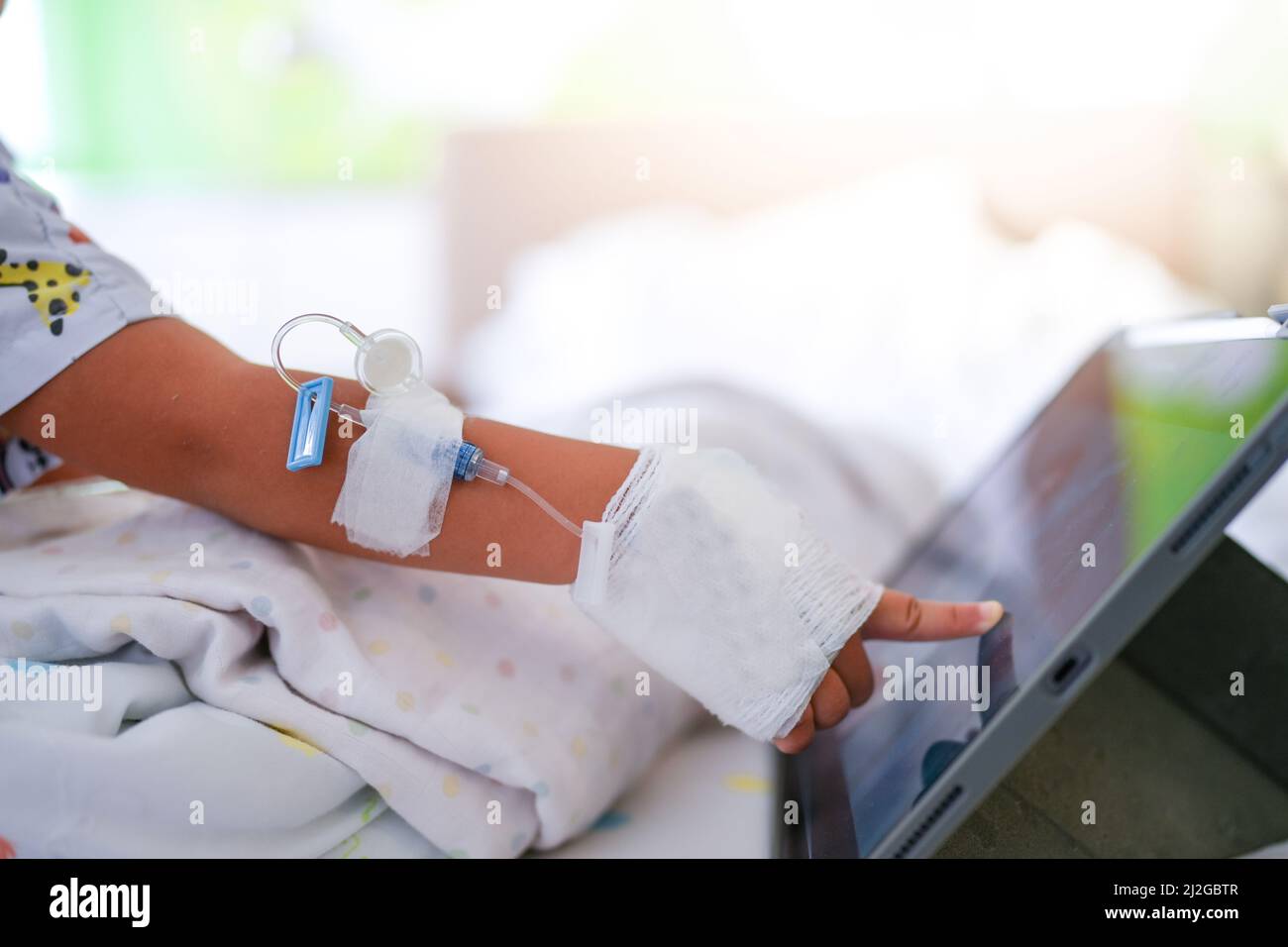 A shot of peripheral venous catheter in a child's arm Stock Photo - Alamy