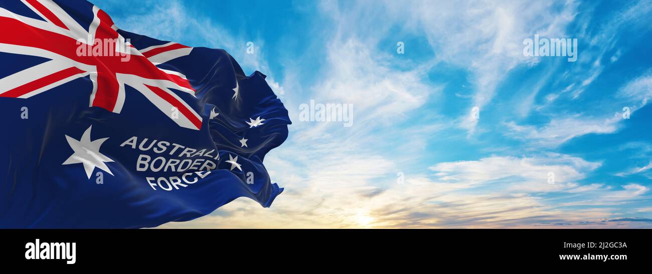 flag of Australian Border Force , Australia at cloudy sky background on ...