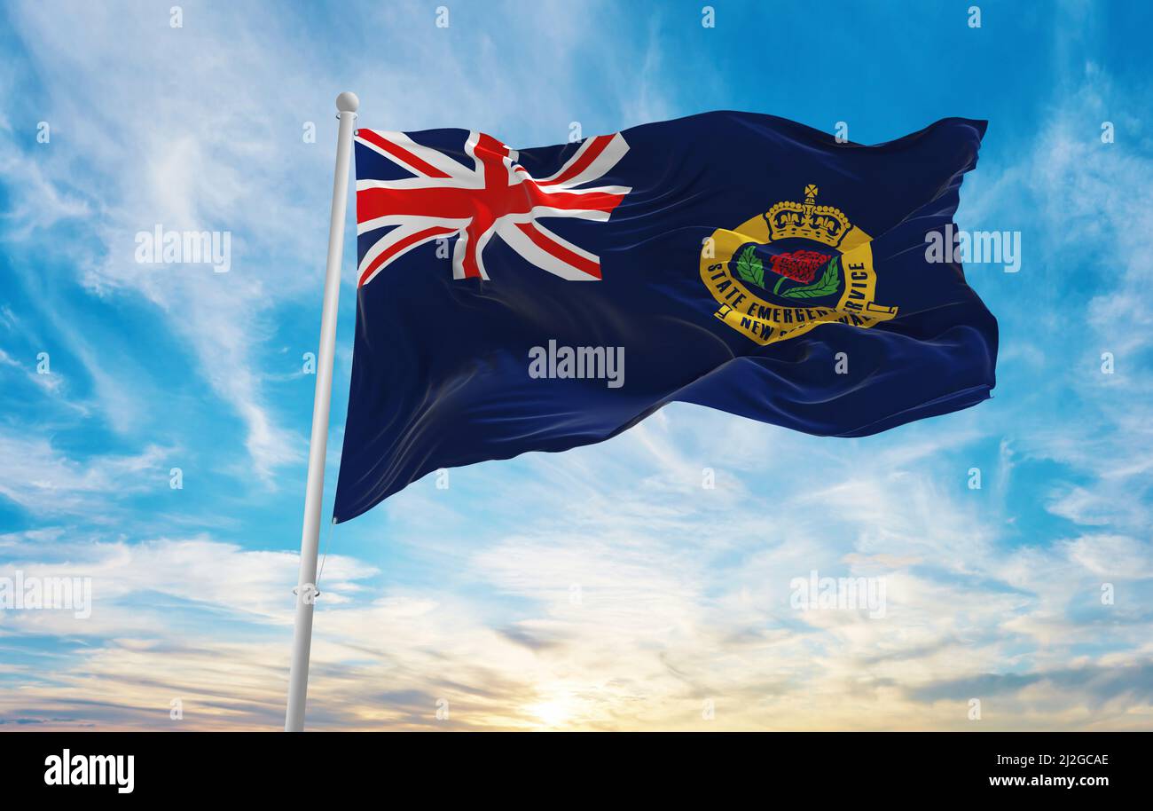 flag of New South Wales SES , Australia at cloudy sky background on ...