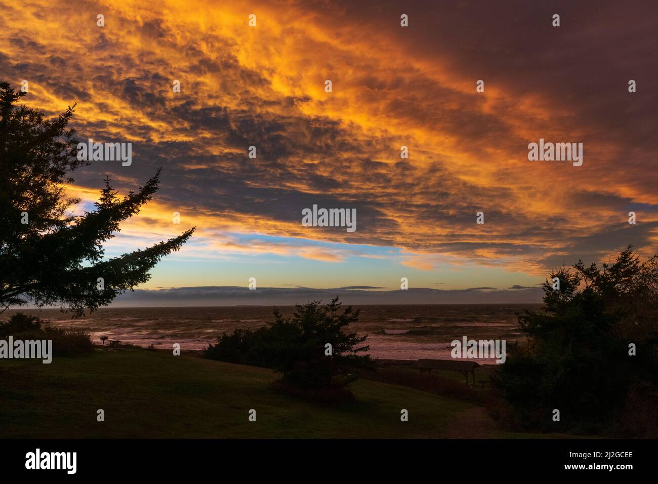 Sunset glows over Admiralty Inlet, Whidbey Island, Washington Stock ...