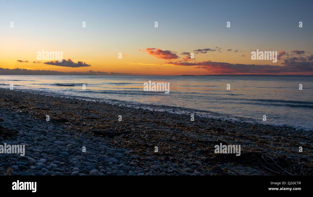Beach sunset over Admiralty Inlet, Whidbey Island, Washington Stock ...