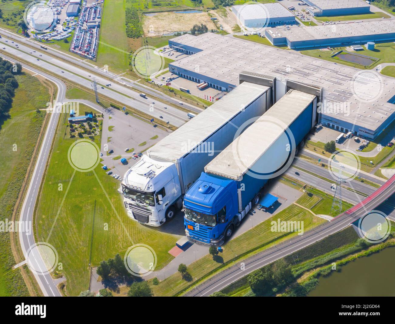 Aerial Shot of Industrial Warehouse Loading Dock where Many Truck with ...