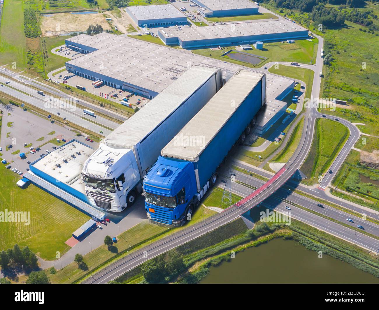 Aerial Shot of Industrial Warehouse Loading Dock where Many Truck with ...