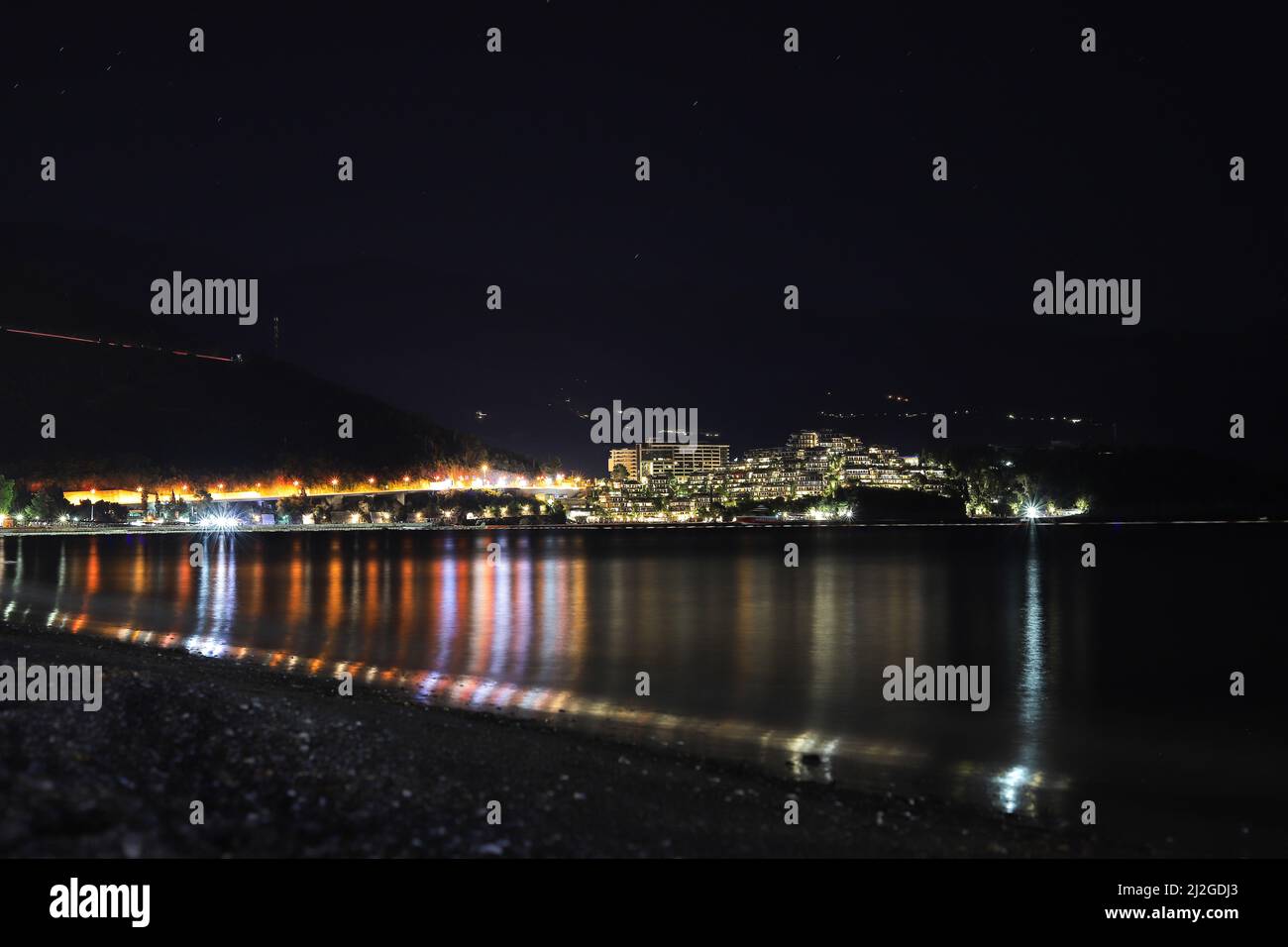 Beach in Budva at night in Montenegro Stock Photo - Alamy