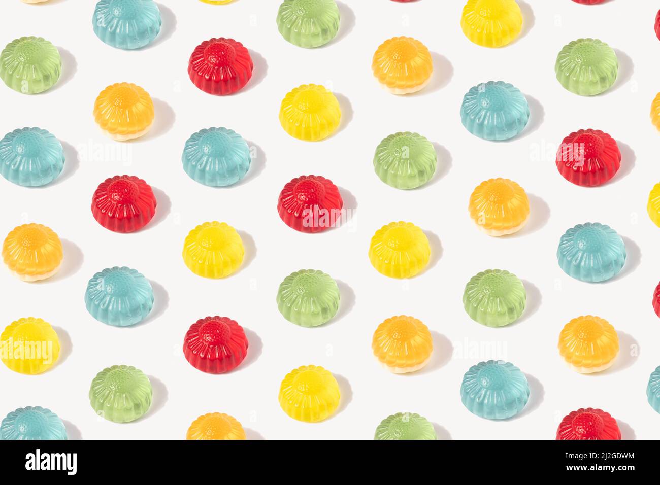 Colorful soft candy flowers on a bright white background. Floral spring ...