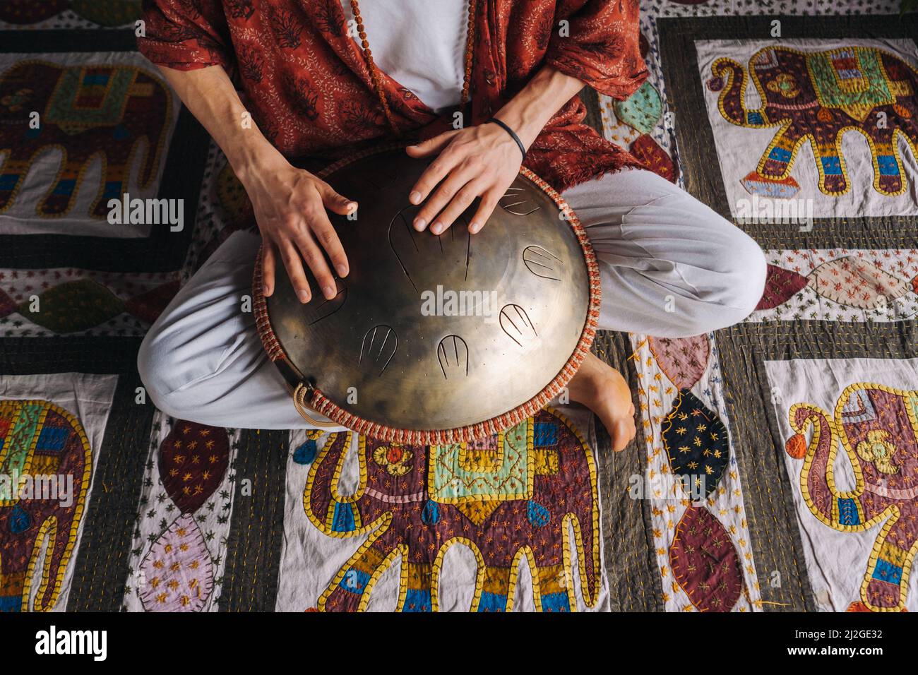Close-up of a man's hand playing a modern musical instrument, the orion ...