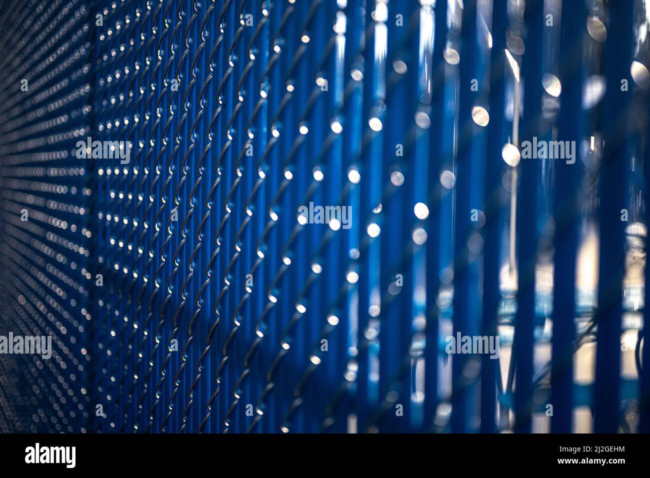 Patterns of a Blue Wire Fence Stock Photo - Alamy