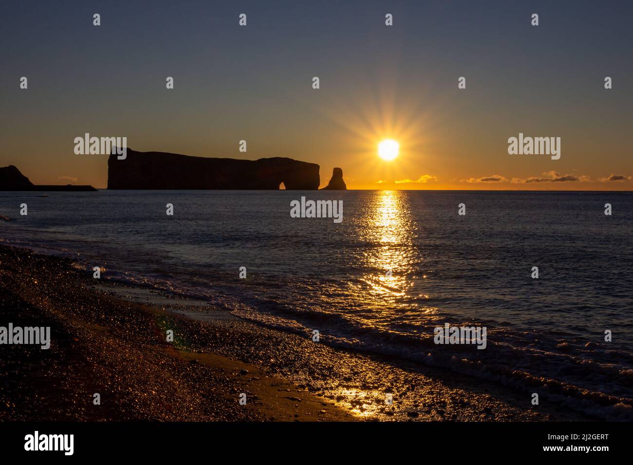 Sunset on Rocher Perce rock in Gaspe Peninsula, Quebec, Gaspesie region ...