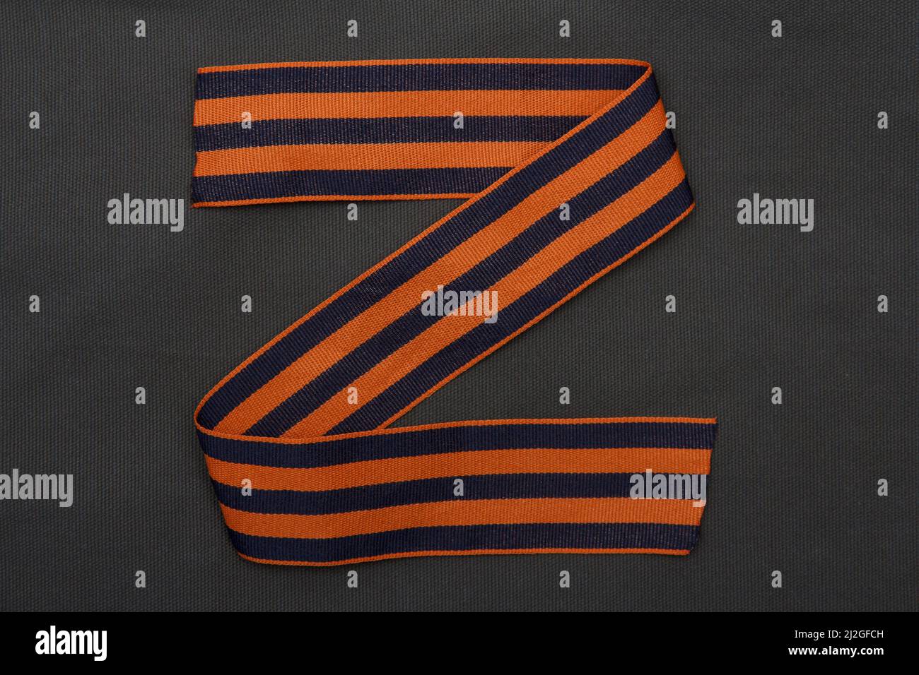 The letter z from the St. George ribbon on a background of green army ...