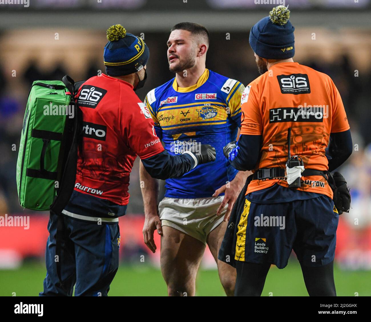 James Bentley #11 of Leeds Rhinos receives treatment on the pitch after ...