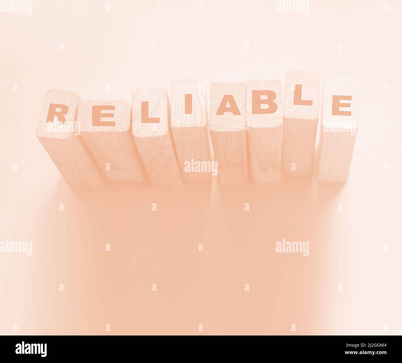Reliable word on a wooden blocks. Trust worthy conept Stock Photo - Alamy