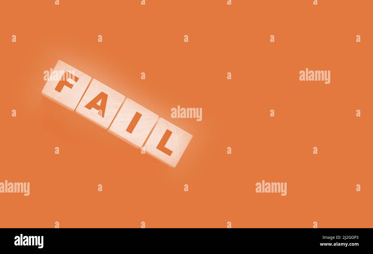 FAIL Word text Written In Wooden Cube blocks on black background ...