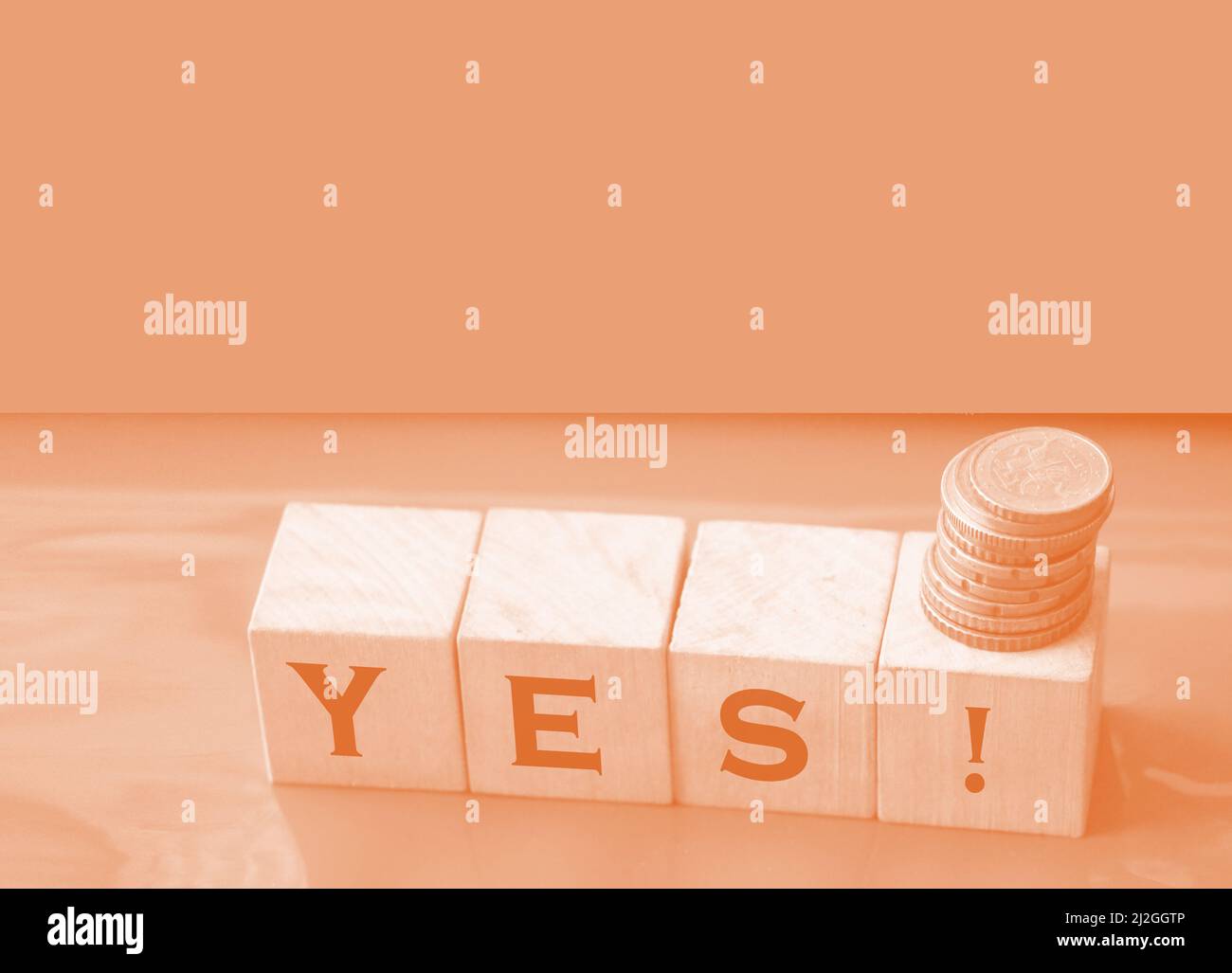 The word Yes written in black letters on wooden blocks. Message spells ...