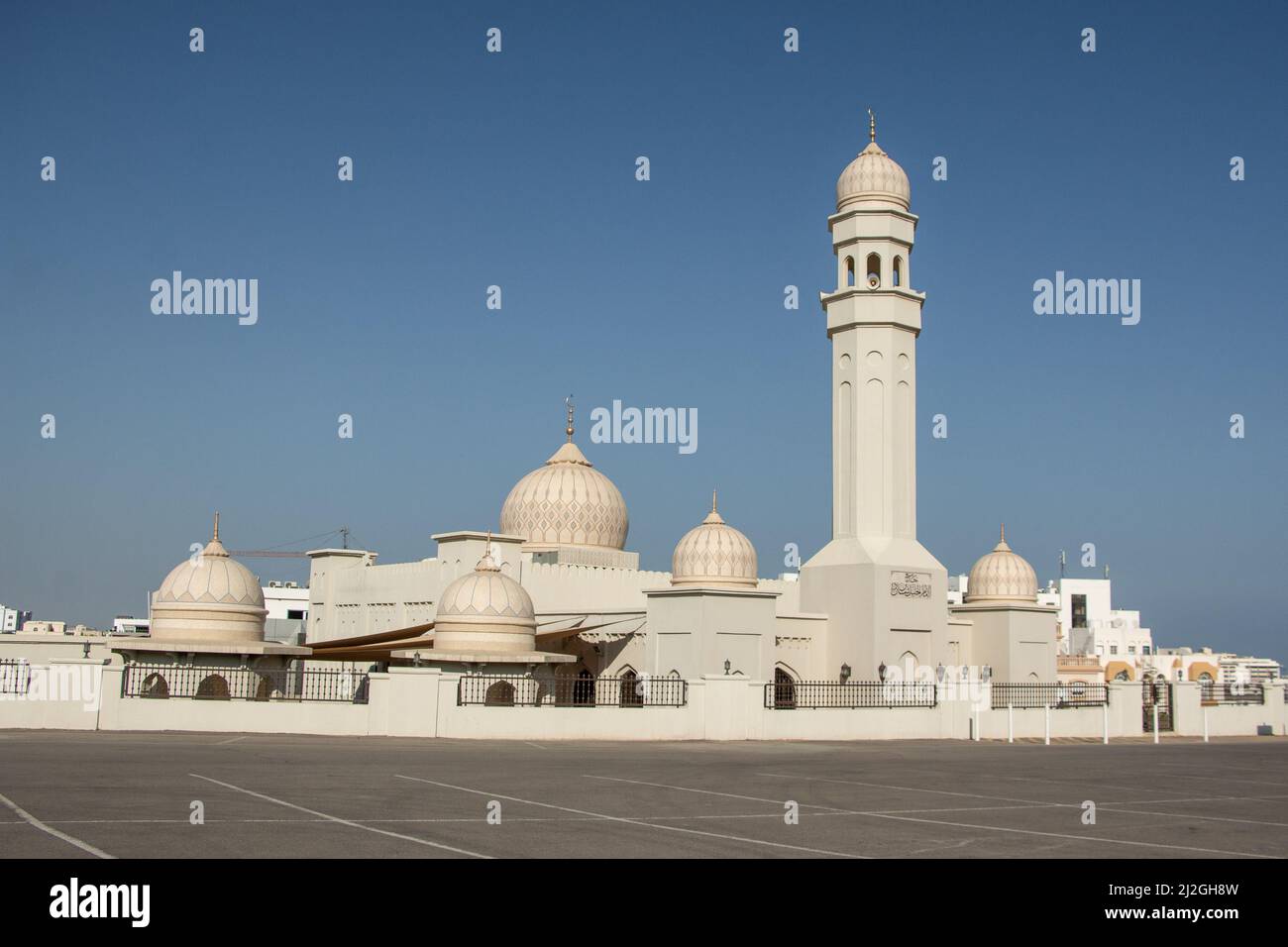 A horizontal shot of a Mosque of Iman Khalil Bin Shadhan under a clear ...