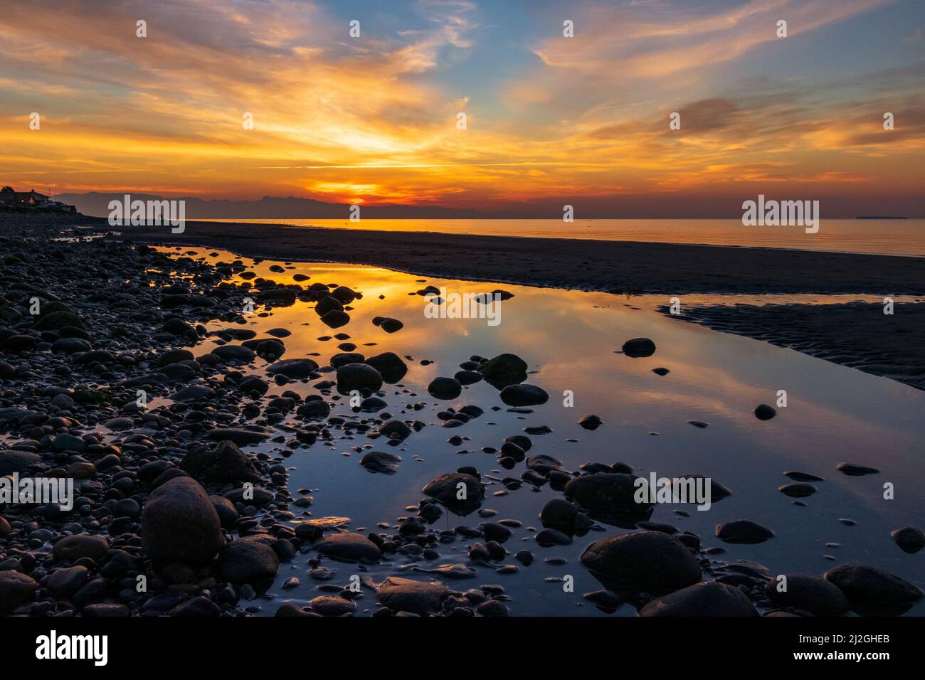 Sunset colors reflect on beach, Whidbey Island, Washington Stock Photo ...