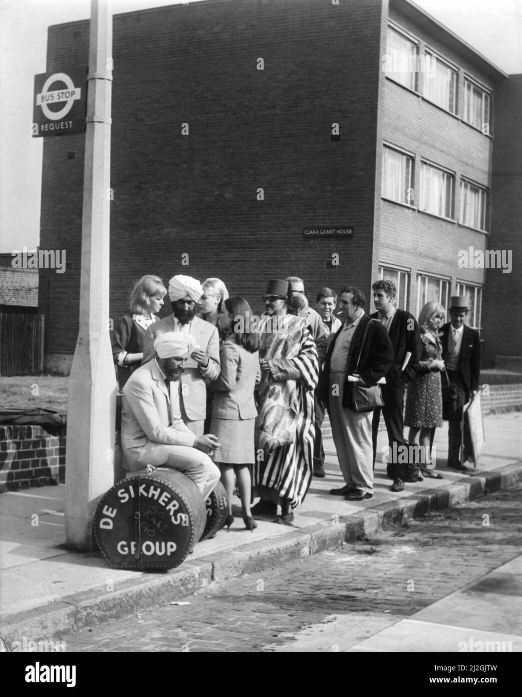 LEON THAU (sitting) TRACEY CRISP (4th left) ROGER DELGADO (6th left ...