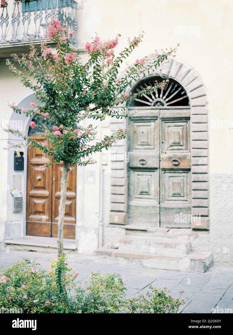 Building with beautiful authentic doors. Lucca, Tuscany, Italy. Typical ...