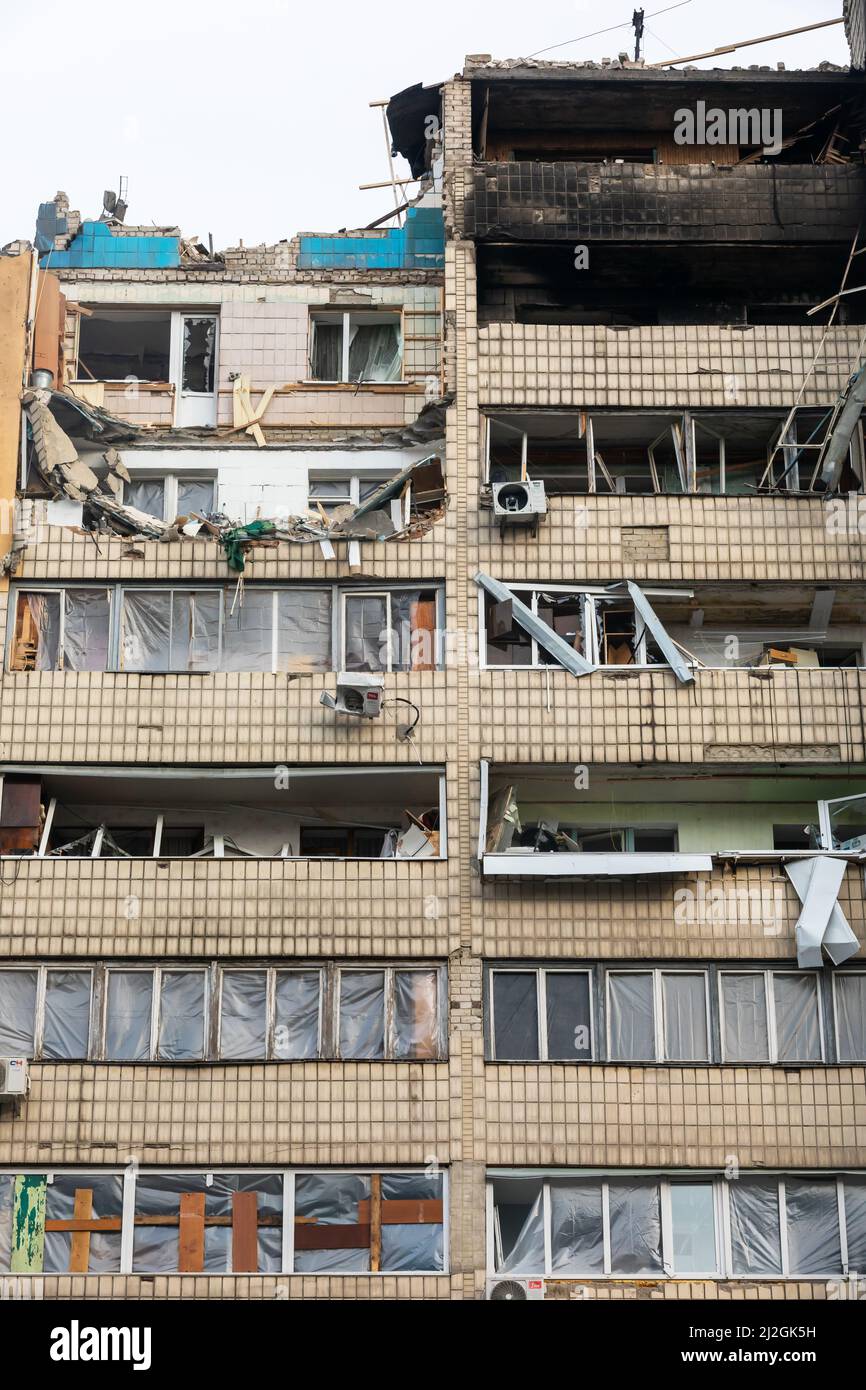 Ruined apartment and broken windows on a residential building damaged ...