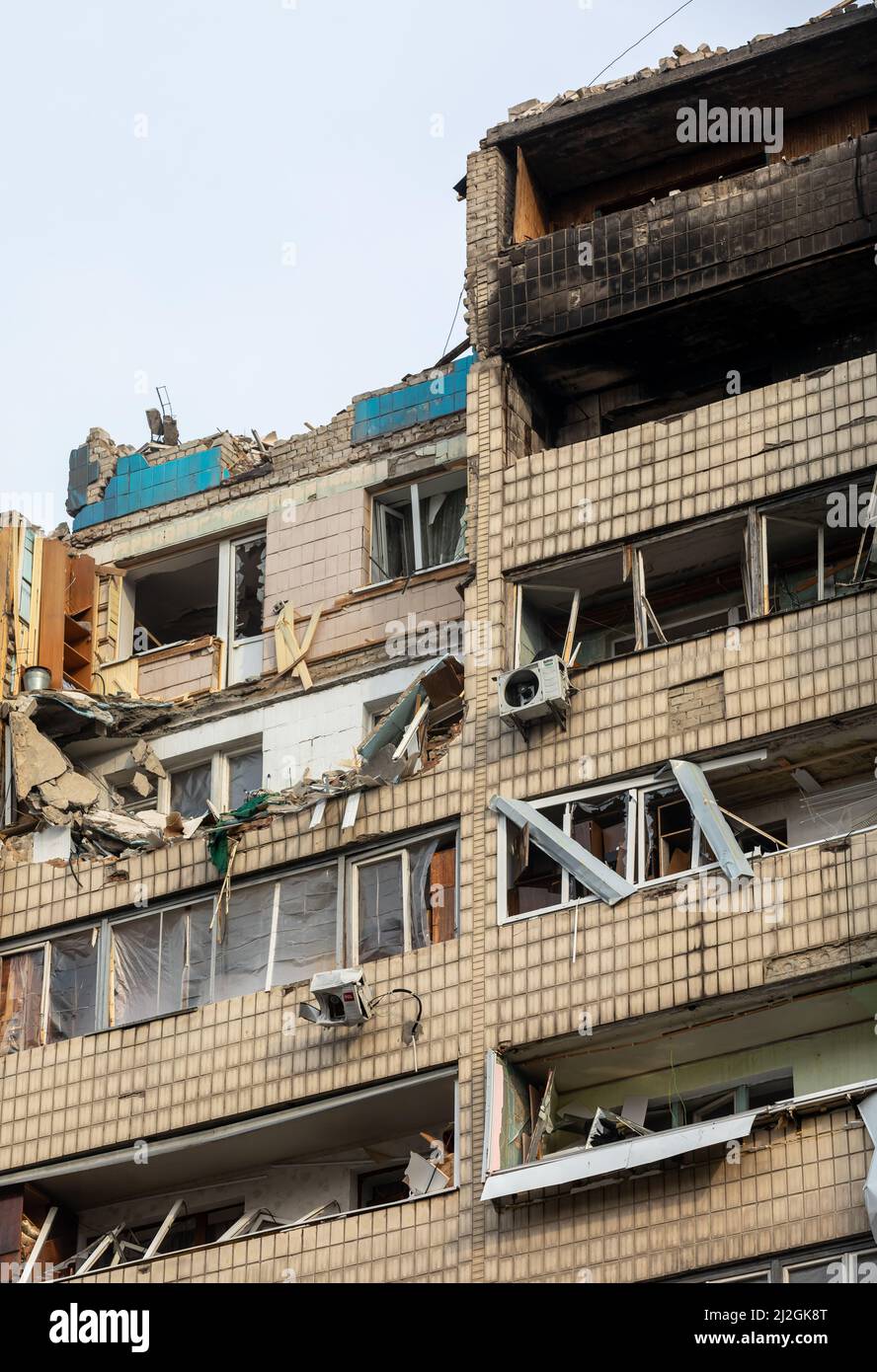 Ruined apartment and broken windows on a residential building damaged ...