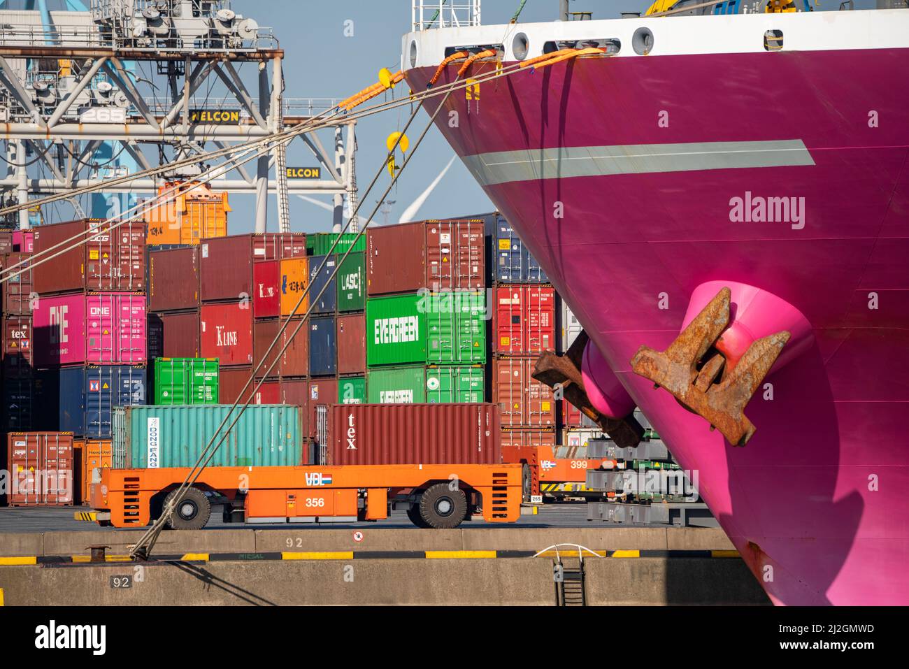 Self-driving, automated container transporters, bring the containers to ...