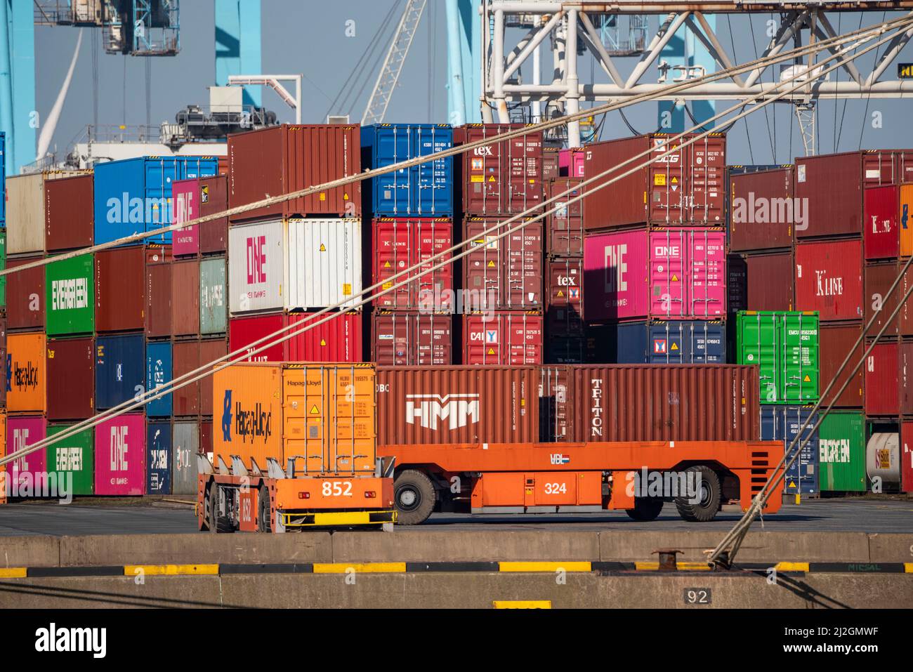 Self-driving, automated container transporters, bring the containers to ...