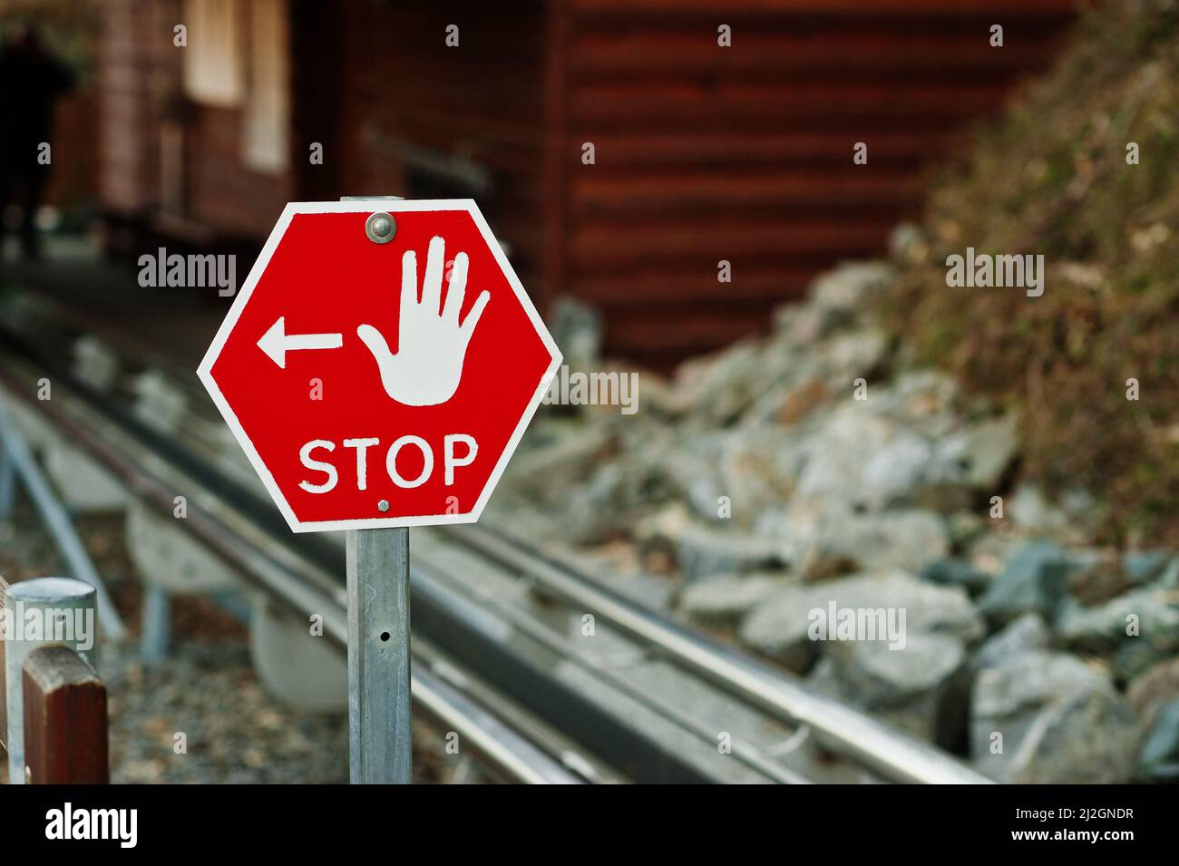 Electric sleigh ride on rails. Stop hand sign Stock Photo - Alamy
