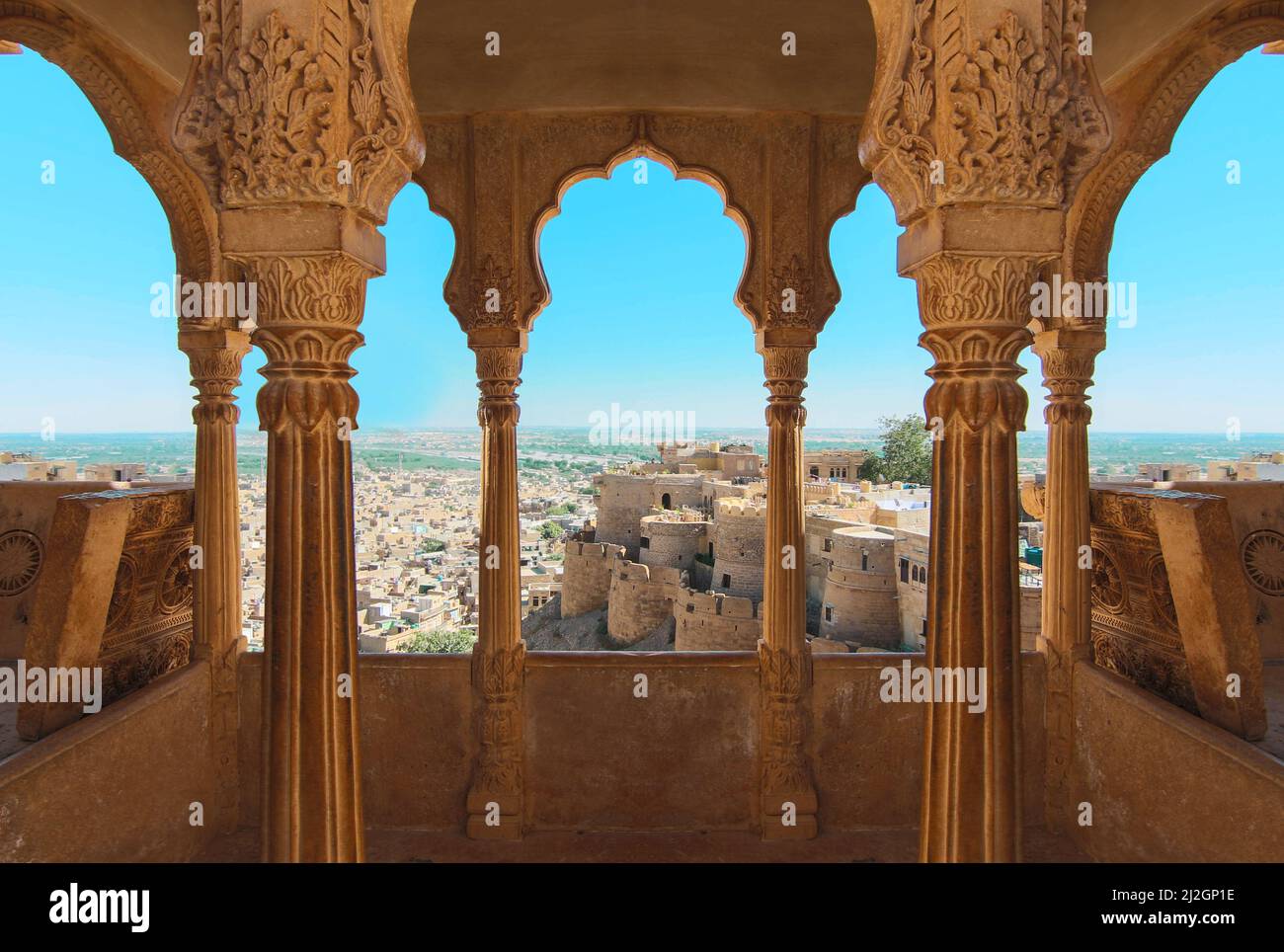 A view from the traditional Indian balcony with arches with the view of ...