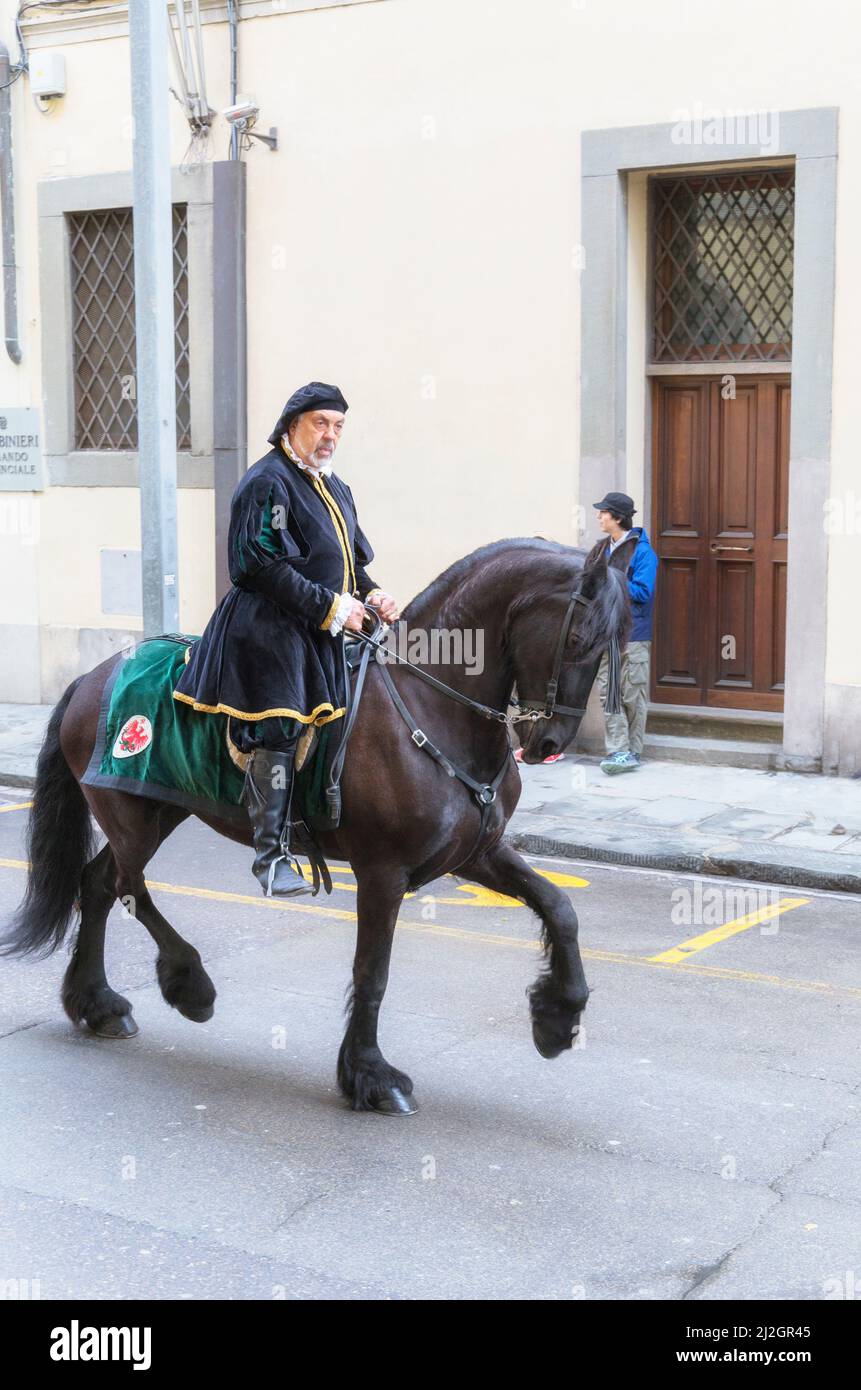 Participant in the Explosion of the Cart festival on parade, Florence ...