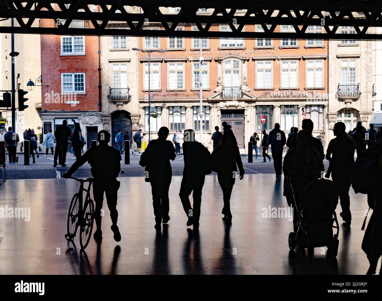 Normal people silhouette; Group of people walking in London Bridge ...