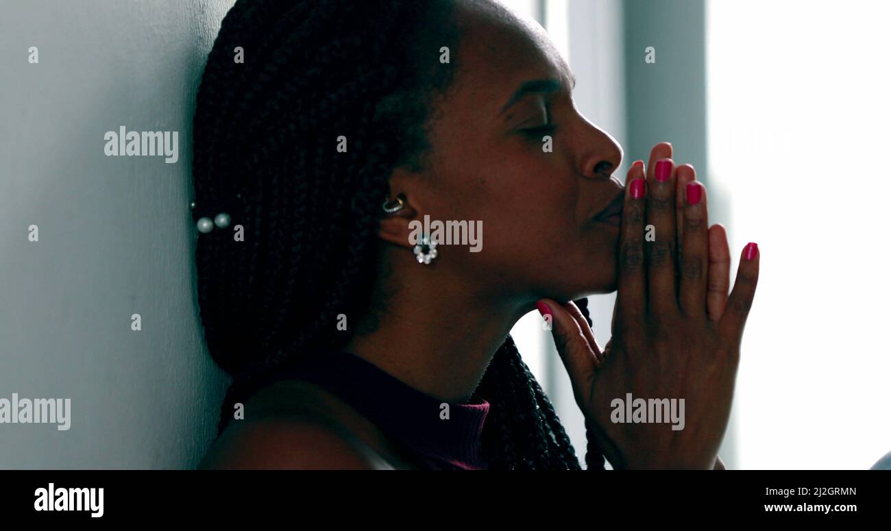 Black woman coping with difficulties Stock Photo - Alamy
