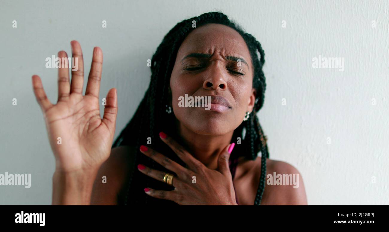 Black woman praying to God, african female raising arms to sky seeking ...