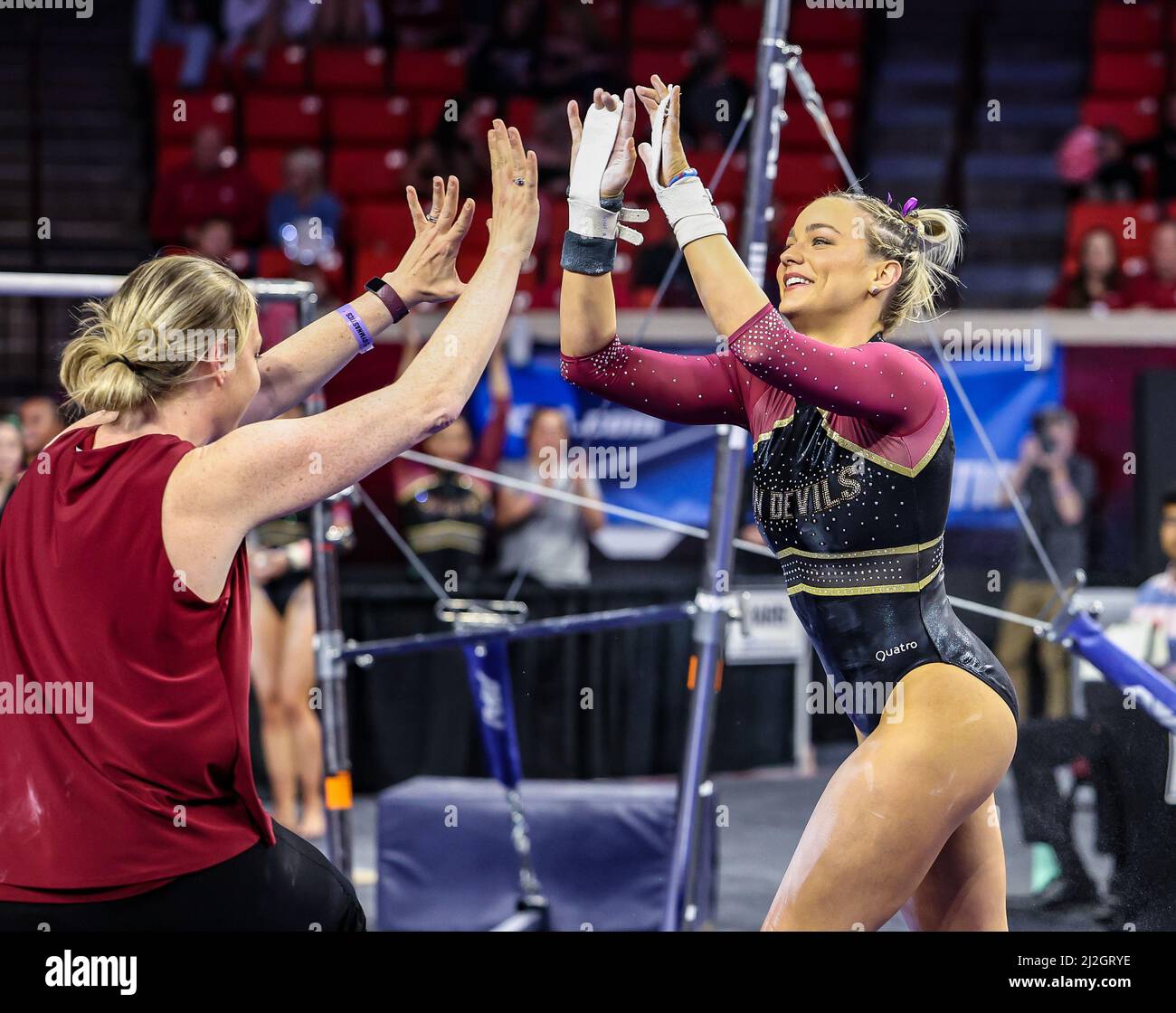 Women's college gymnastics coach hi-res stock photography and images ...