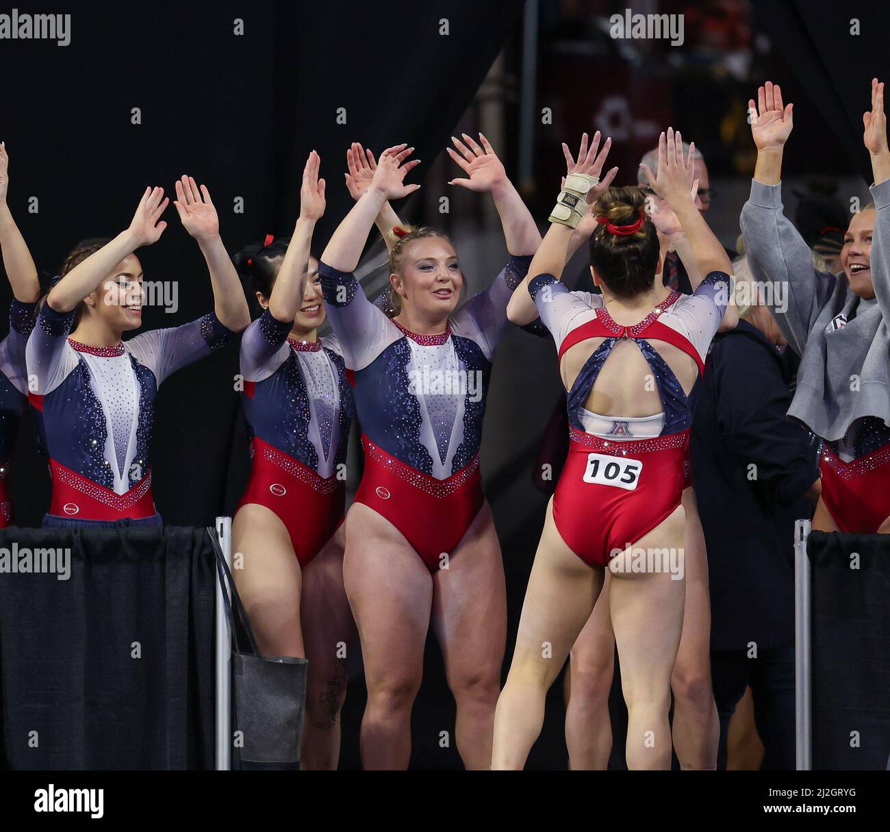 Norman, OK, USA. 31st Mar, 2022. Arizona's Caroline Henry high fives ...