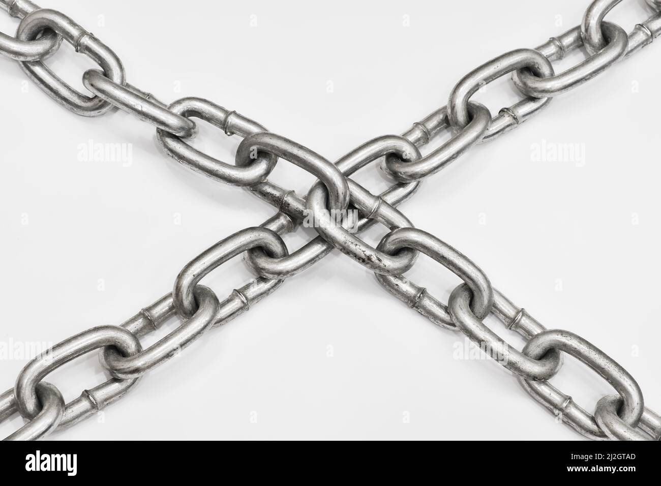 Old metal chain cross on white background. Concept of imprisonment ...