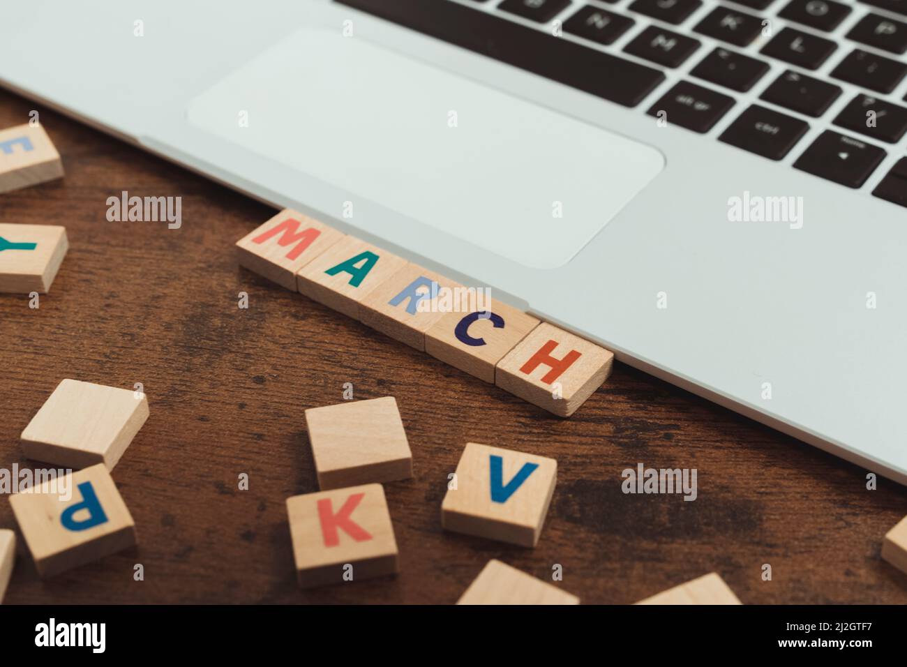 MARCH word made of wooden alphabet letters vocabulary game placed on ...